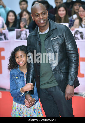 Actor Dave Chappelle and his daughter Sonal arrive on the red carpet ...