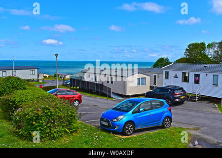 Green static caravans mobile homes trailers on a campsite in Tywyn ...