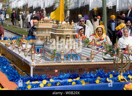A float of the Golden Temple of Amritsar amidst tens of thousands of ...