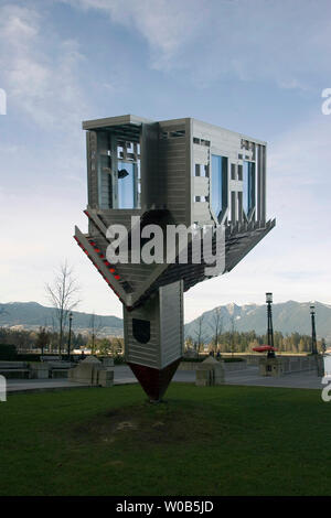 Device to Root out Evil in context. A sculpture of an upside down red ...