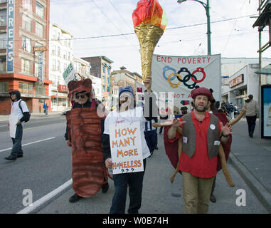 Mascots Creepy the Cockroach (Bernie Boyd, R.), Chewy the Rat (Bob ...
