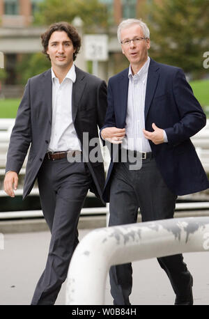Prime Minister Justin Trudeau joins Elder Claudette Commanda, left, and ...
