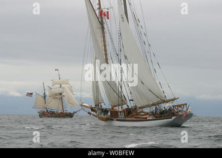 The 105-foot square topsail ketch Hawaiian Chieftain (close) based out ...