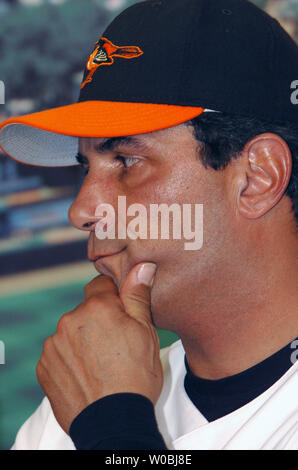 Lee Mazzilli, manager of the Baltimore Orioles, looks out over his team ...