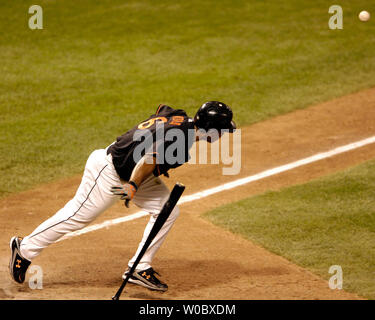 Baltimore Orioles center fielder Tike Redman scores the winning run in ...