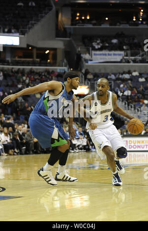 Minnesota Timberwolves forward Ryan Gomes (8) looks for a shot as he is ...