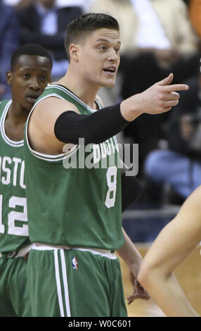 Boston Celtics forward Jonas Jerebko (8) is fouled by Orlando Magic ...