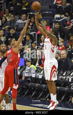 Houston Rockets forward Trevor Ariza goes up for a shot against the ...