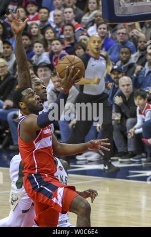 Milwaukee Bucks guard Eric Bledsoe runs up court during the first half ...