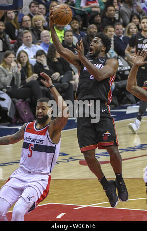 Miami Heat forward Markieff Morris, right, talks with assistant coach ...