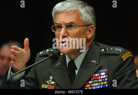 Gen. George W. Casey, commander, Multi-National Force-Iraq, passes ...