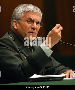 Gen. George W. Casey, commander, Multi-National Force-Iraq, passes ...