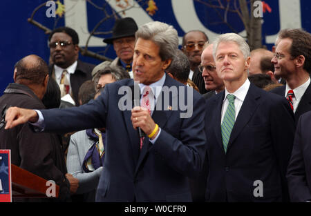 President Bill Clinton looks on as Carmen Gordon shows the Medal of ...