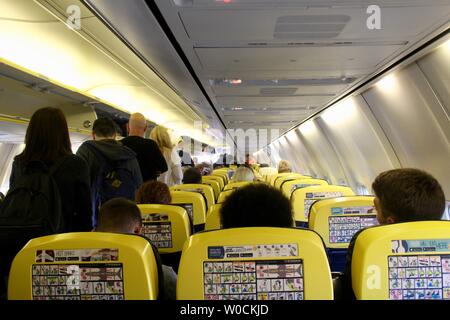 Passengers inside a Ryanair plane Stock Photo - Alamy