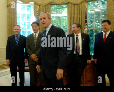 President George W. Bush Stands with Crew Members of the Space Shuttle ...