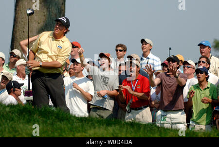 Phil Mickelson watches on the sixth hole during the first round at the ...