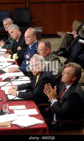 Retired Marine Major General James L. Day listens to U.S. President ...