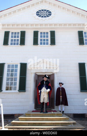 Dean Malissa, playing the role of President George Washington, and an ...