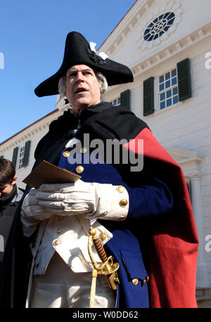 Dean Malissa, playing the role of President George Washington, and an ...