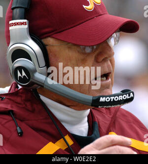Washington Redskins head coach, Joe Gibbs, second from the left, looks ...