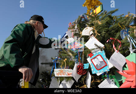 Paul Stancliff helps to decorate a Christmas tree at the Vietnam ...