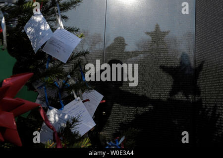 Paul Stancliff helps to decorate a Christmas tree at the Vietnam ...