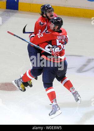 Washington Capitals Mike Green (52) takes a shot against the Montreal ...