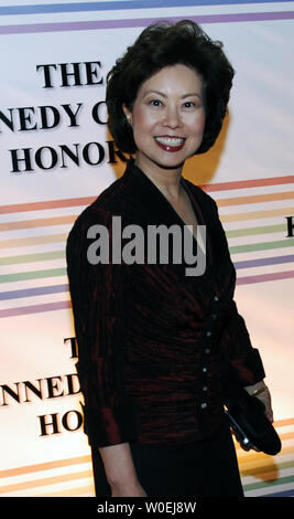 Labor Secretary Elaine Chao, center, talks with people at The ...