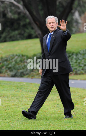 President Bush waves as he departs the White House in Washington ...