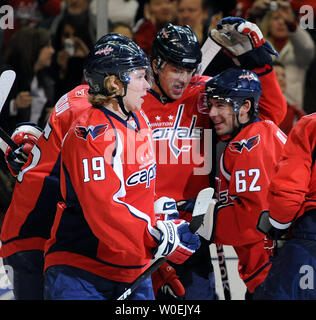 Washington Capitals defenseman Sean Collins (62) and teammates ...