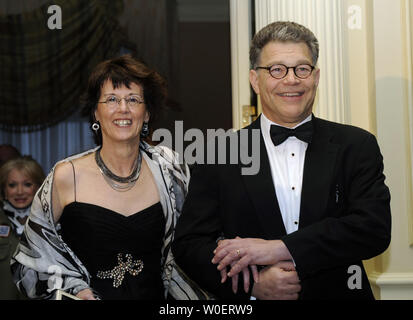 Al Franken (R) and his wife Franni arrive at the USO Annual Awards ...