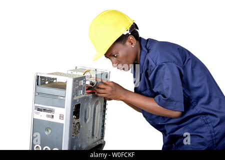 Computer maintenance technician tests the electrical circuits of the ...