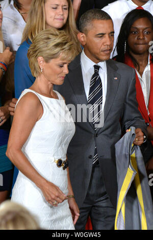 Baylor head coach Kim Mulkey cheers with her bench during the first ...