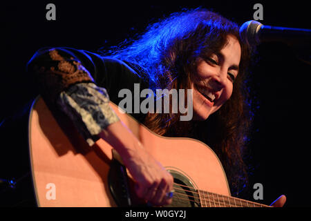 Lead guitarist Steph Paynes of Lez Zeppelin belts out a number at The ...