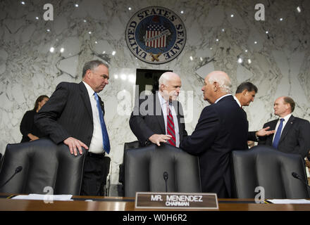 Sen. Tim Kaine, D-Va., left, and Sen. Chris Murphy, D-Conn., confer at ...
