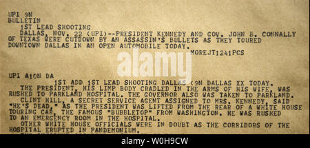 In a photograph of the original teletype dispatch, a UPI 'FLASH' notes ...