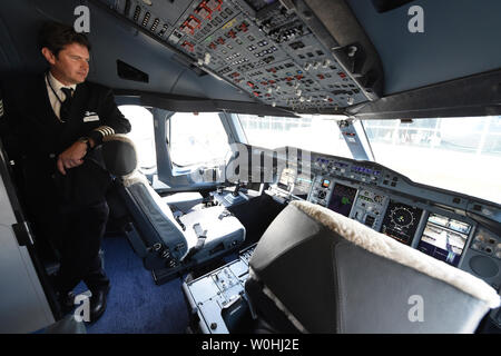 British Airways Captain Mike Blythe on the flight deck of a British ...