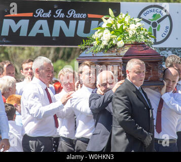 The coffin of rally driver Manus Kelly is taken from St Columba's ...