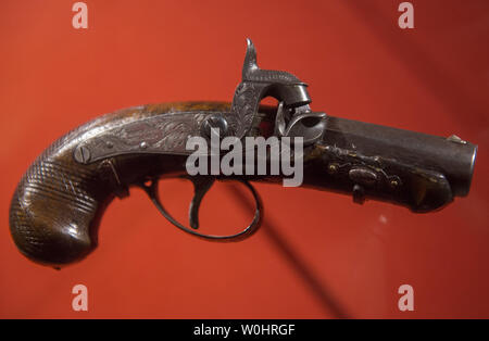 John Wilkes Booth Deringer pistol is displayed in the exhibit "Silent ...