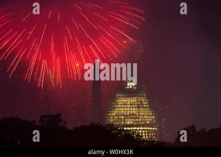 Fireworks explode over the National Mall in honor of Independence Day ...