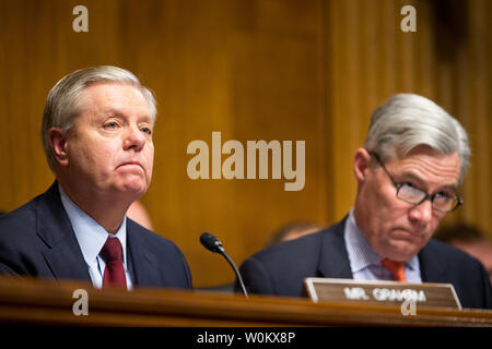 Sen. Lindsey Graham, R-S.C., right, hugs his sister Darline Graham ...