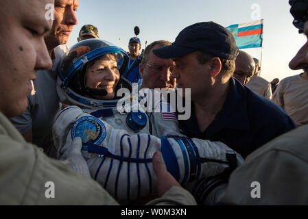 NASA Expedition 51 astronaut Peggy Whitson float through the ...