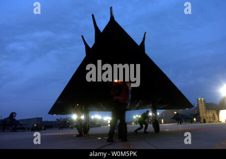 49th Aircraft Maintenance squadron Airmen attach an engine cover panel ...