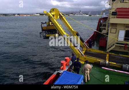 The remotely operated vehicle (ROV) "Scorpio Two" is launched from the ...