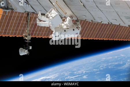 Astronauts Steven Swanson and Patrick Forrester (out of frame), both ...