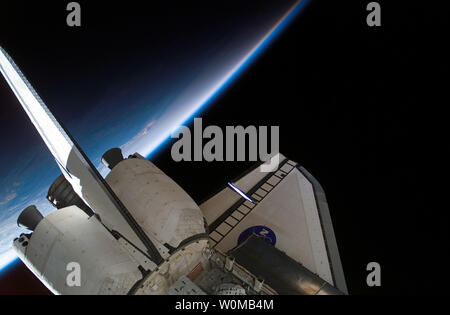 Space Shuttle Endeavour's vertical stabilizer and orbital maneuvering ...