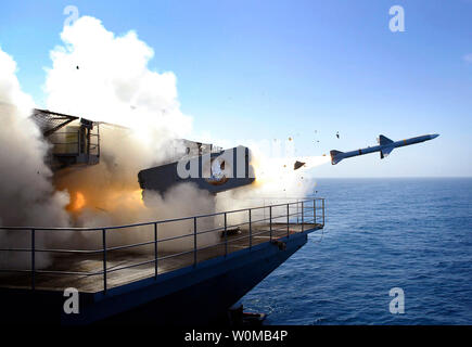 A RIM-7 Sea Sparrow surface missile is launched from the aircraft ...