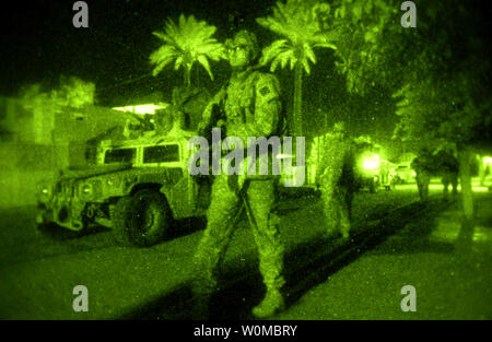 Infrared night vision scope on an assault rifle outdoors Stock Photo ...