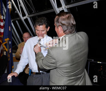 NASA Flow Director for space shuttle Endeavour, Ken Tenbusch (left ...