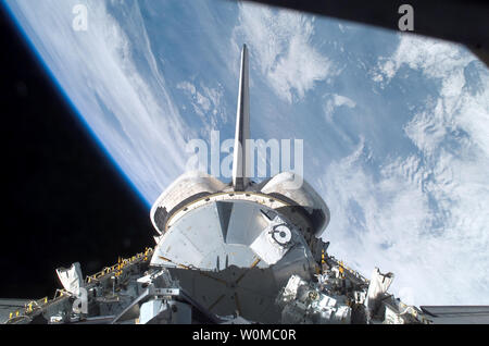 Space Shuttle Endeavour's vertical stabilizer and orbital maneuvering ...